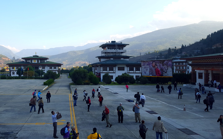 Passengers at Paro Airport, Bhutan – Antoine Lewis aka The Curly-Haired ...
